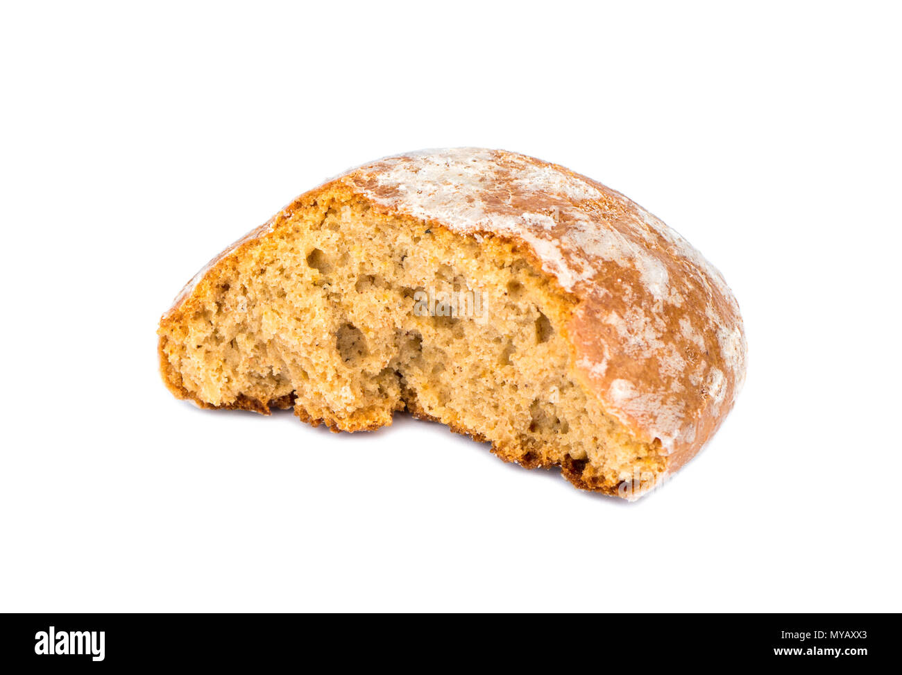 Bitten half of Russian spice-cake with frosting isolated on white ...