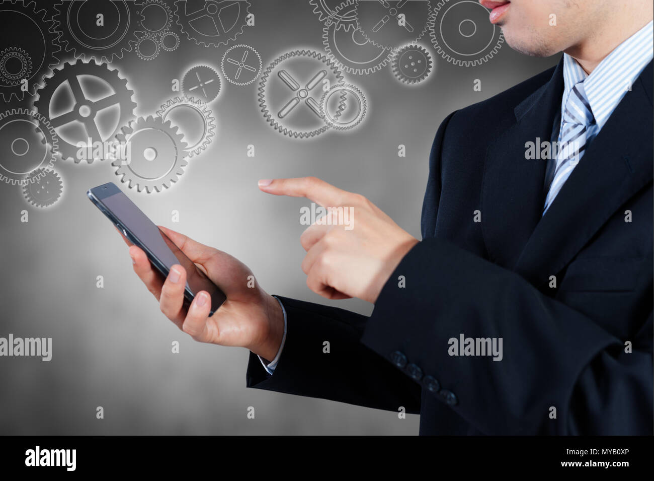 Businessman design gear, business strategy concept Stock Photo - Alamy