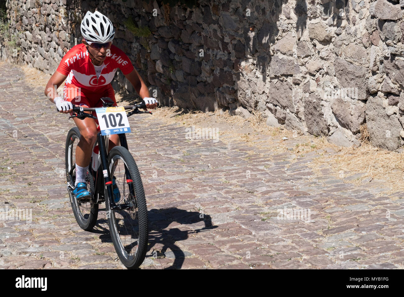 Turkish female cyclist competes in an international mountain bike race ...