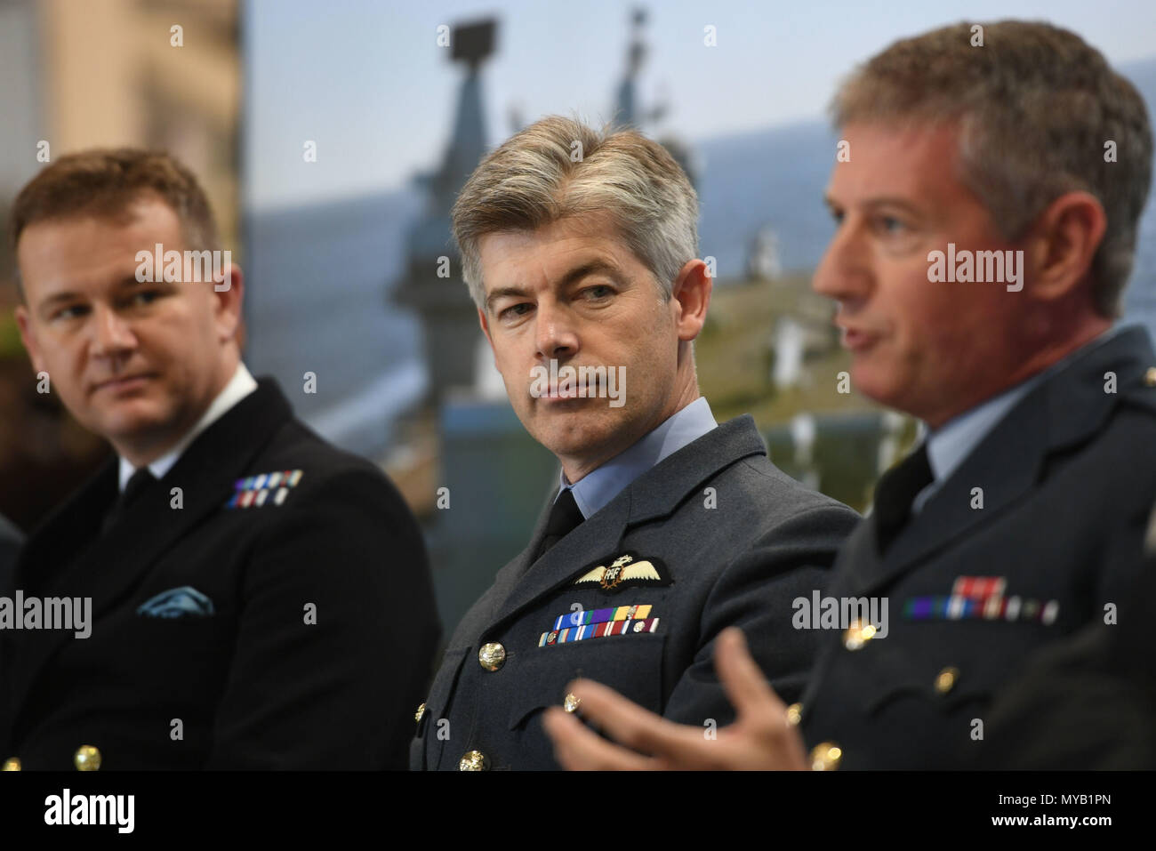 (left to right) Captain Adam Climk, Air Commodore David Bradshaw, Air ...