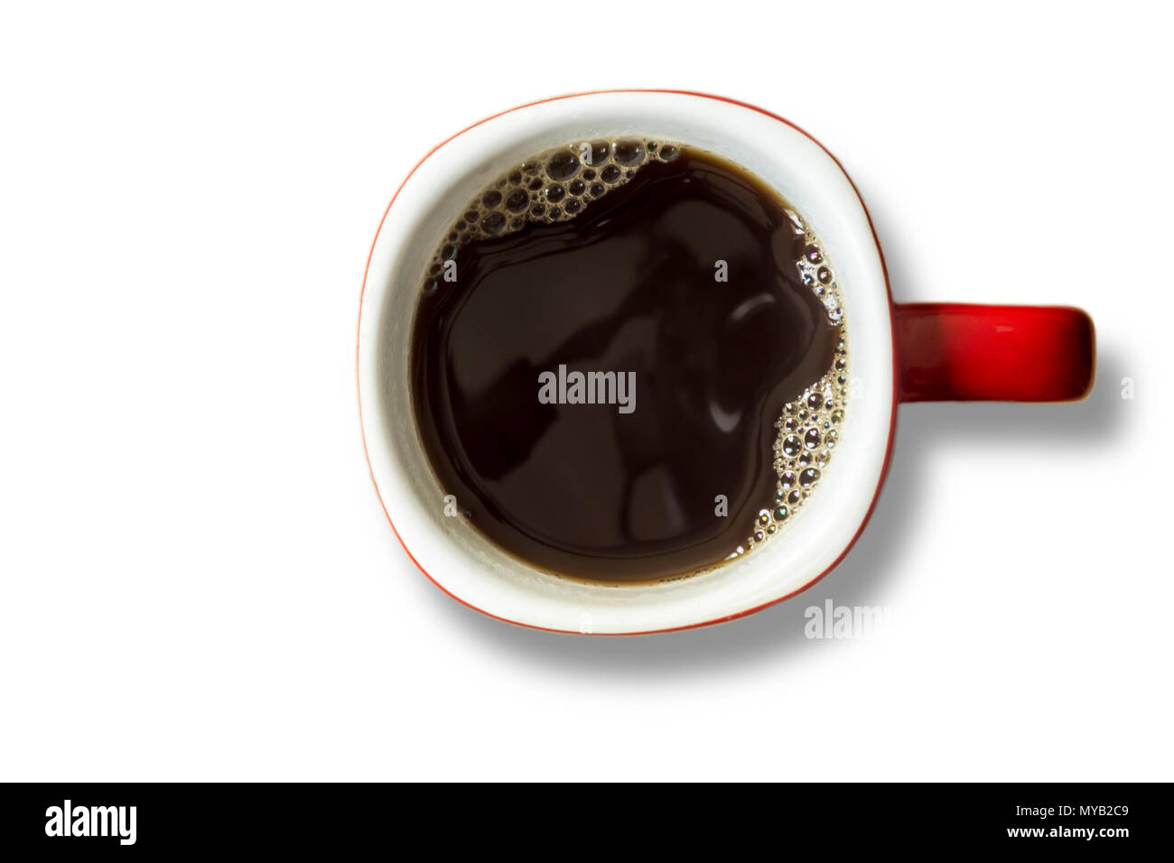 Cooked coffee in a cup. Black coffee and coffee foam. Turkish coffee ...