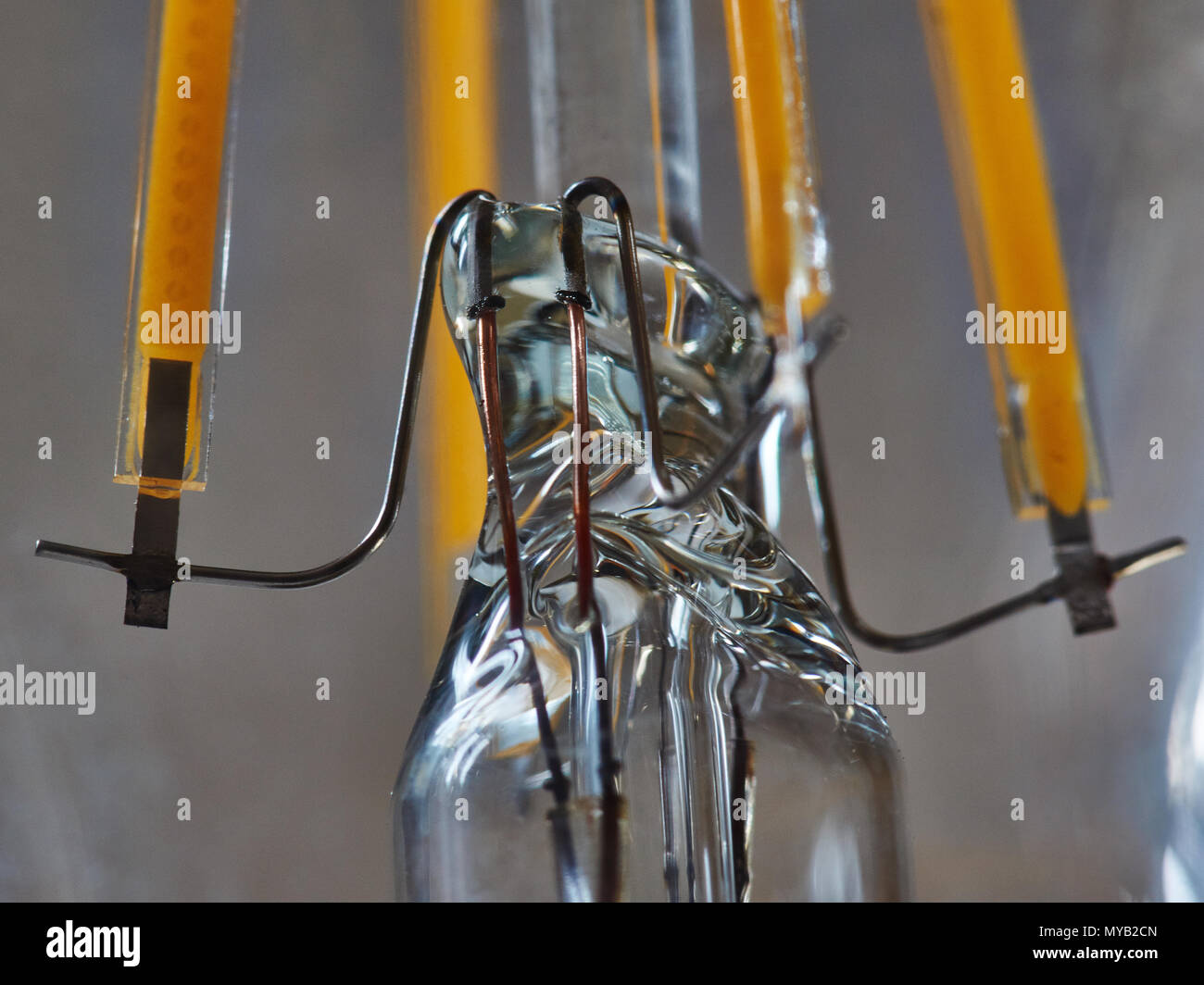 Fragment of the LED lamp under the microscope. The central glass ...