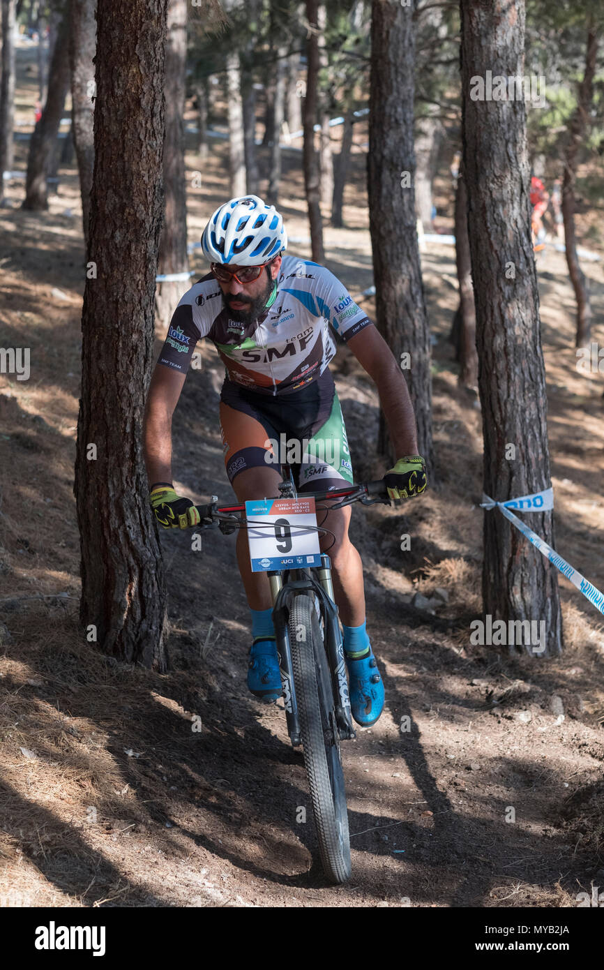 Greek male cyclist competes in an international mountain bike race in ...