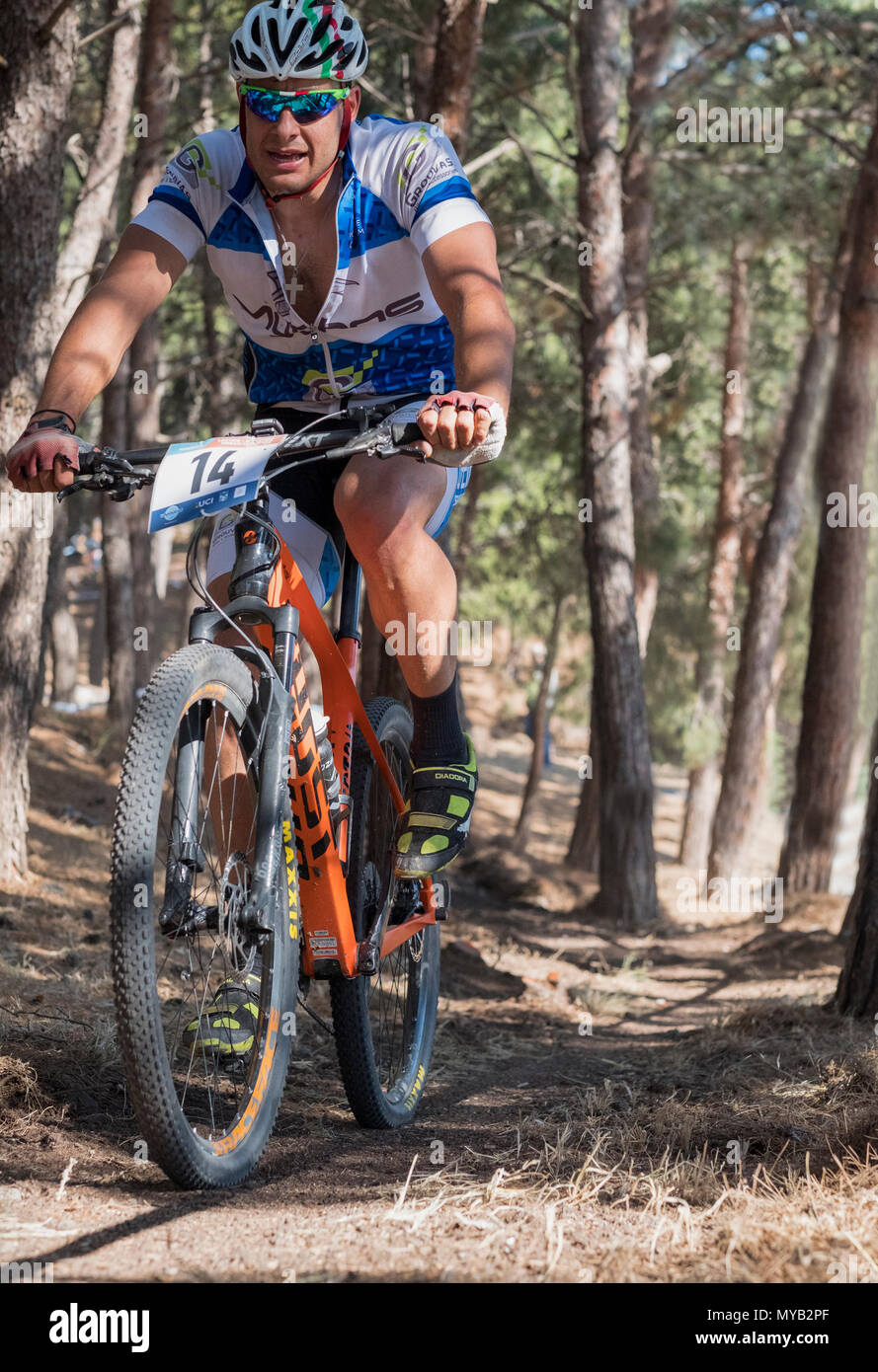 Greek male cyclist competes in an international mountain bike race in ...