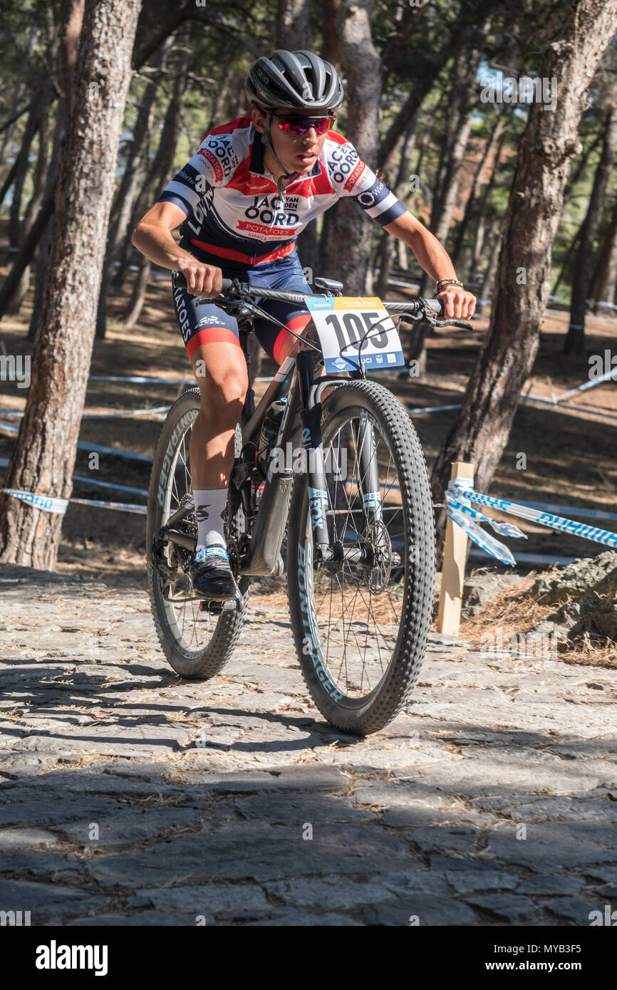 Dutch female cyclist competes in an international mountain bike race in ...
