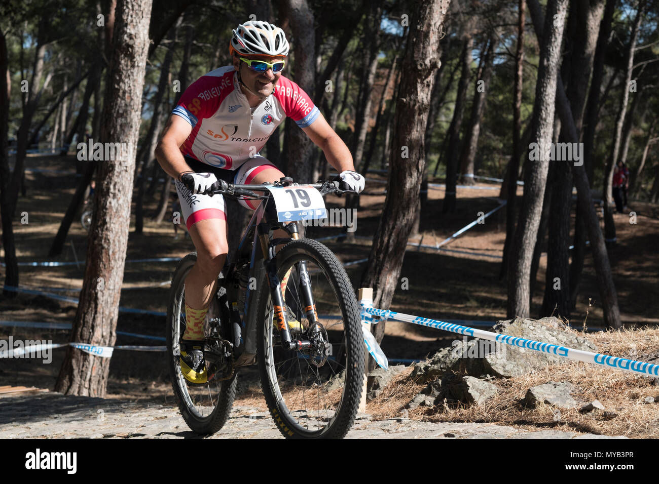 Greek male cyclist competes in an international mountain bike race in ...
