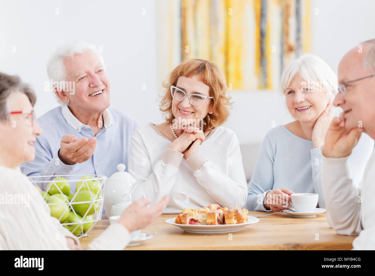 Older people meeting at party hi-res stock photography and images - Alamy