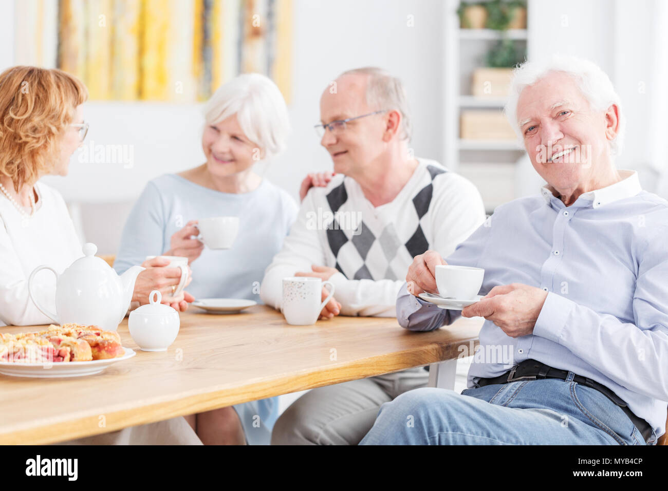 Men Drinking Coffee With Friends
