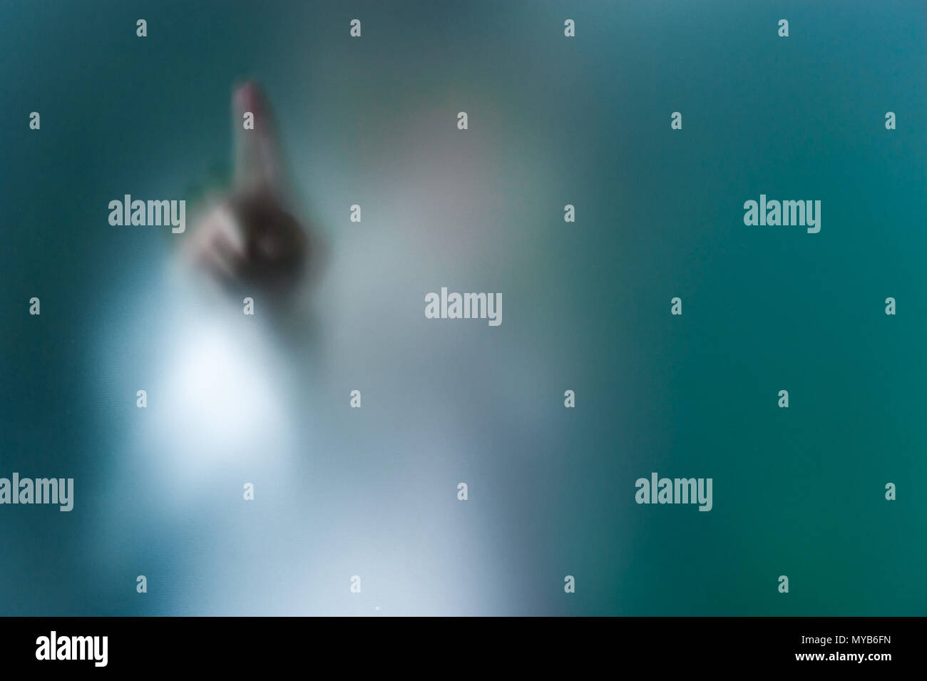 hand writing on blurred glass wall, abstract background with space ...