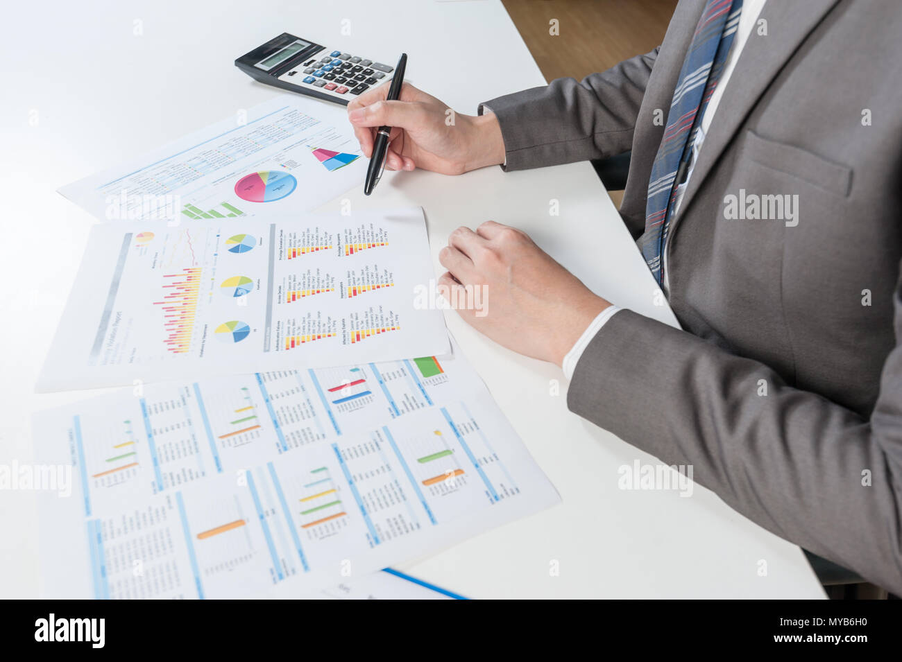 Businessman show analyzing report, business performance concept Stock ...