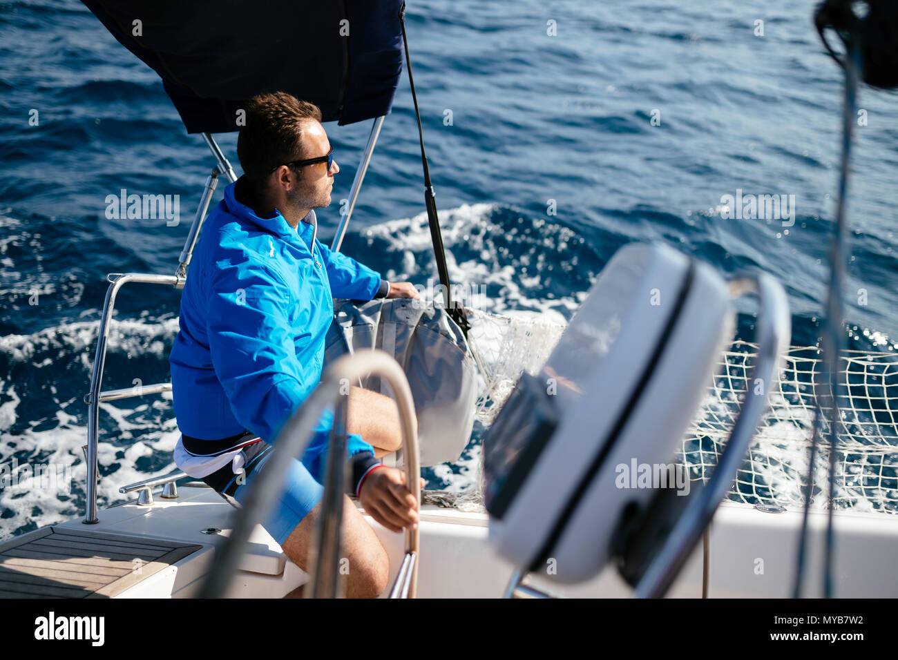 Man sailing boat hi-res stock photography and images - Alamy