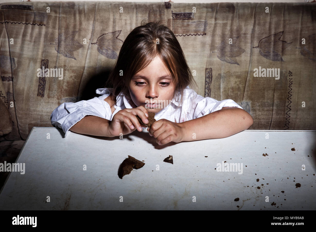 Child abuse. Poor child in slum begging you for help concept for ...