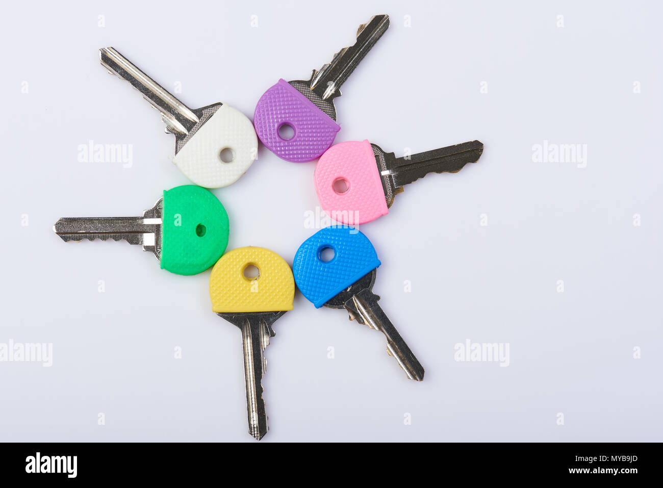 Circle shape key laying on white background isolated Stock Photo - Alamy