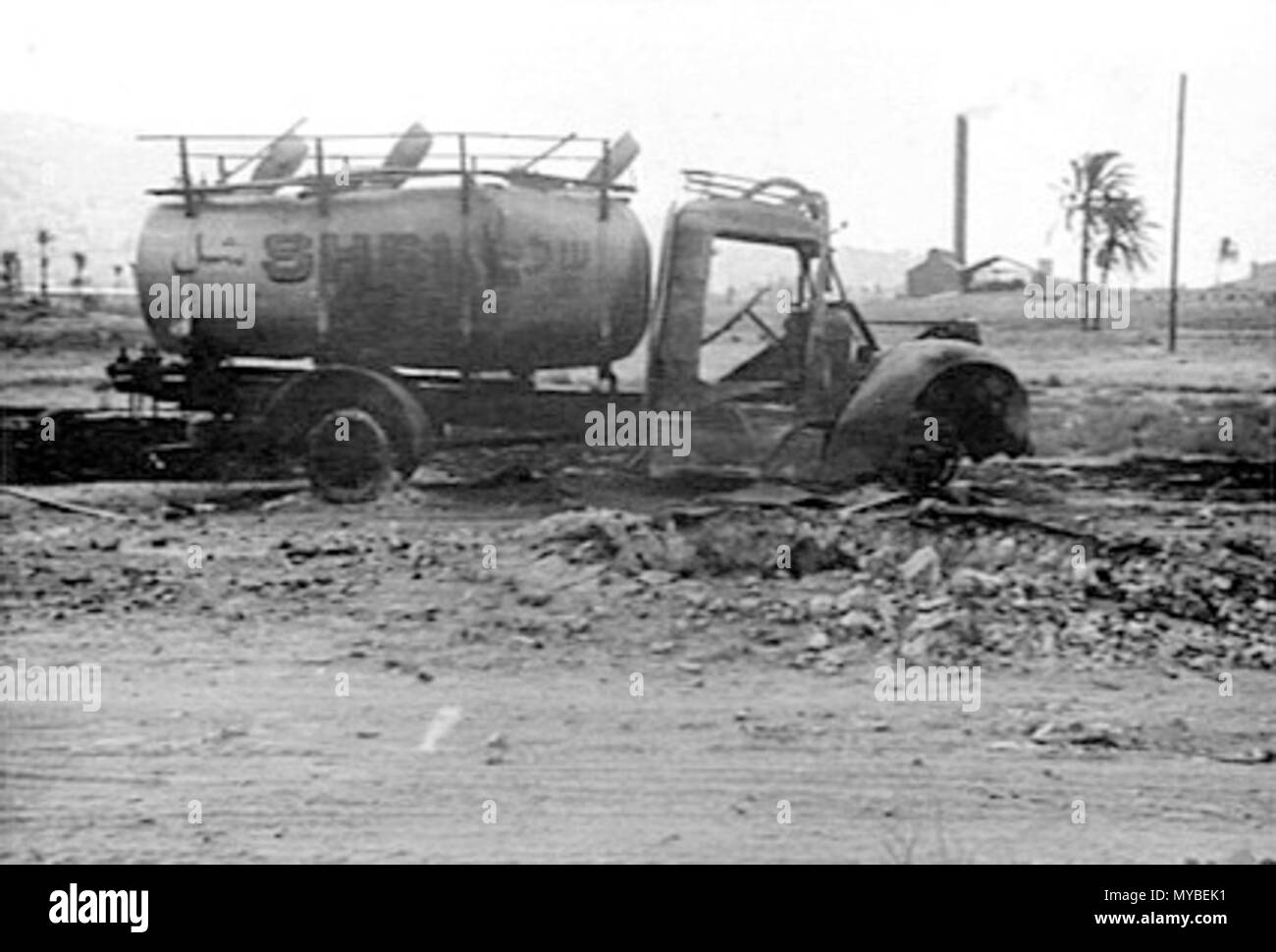 . English: HAIFA, PALESTINE. 1940-07-15. A BURNT OUT SHELL OIL COMPANY ...