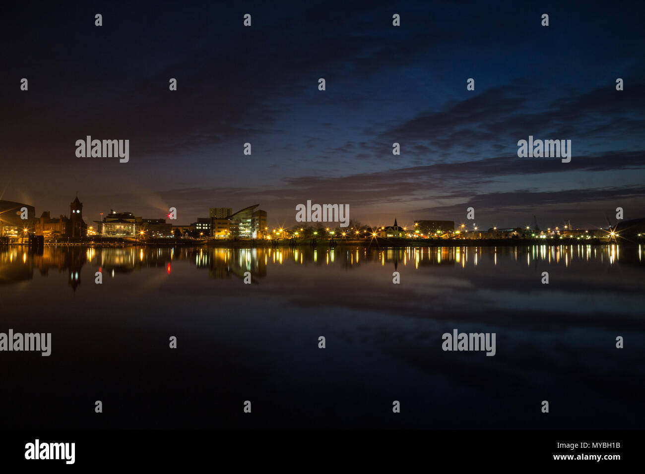 Cardiff Bay's architecture as night turns into dawn with subtle sunrise ...