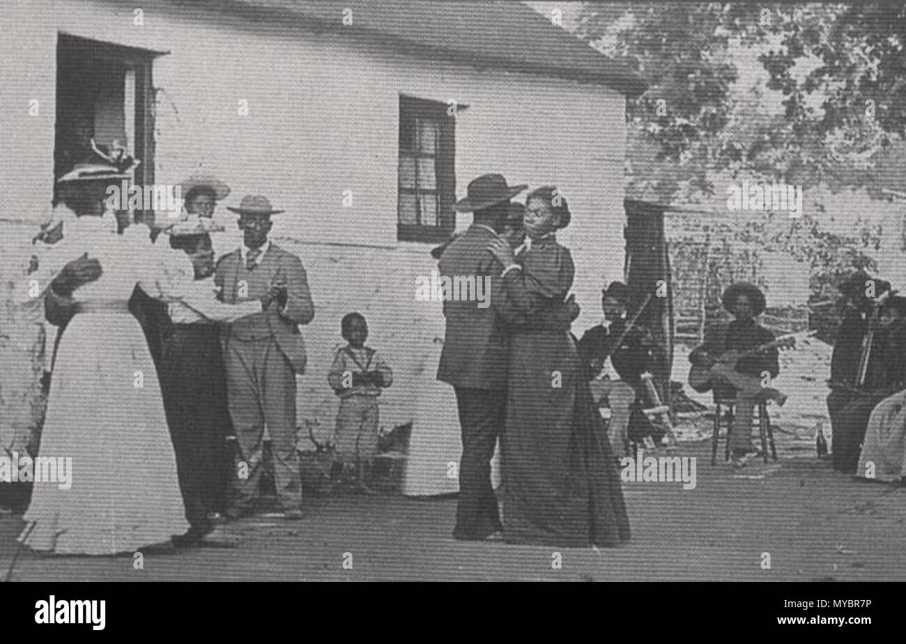 . English: Old photograph of traditional event with dancing. Cape Town ...