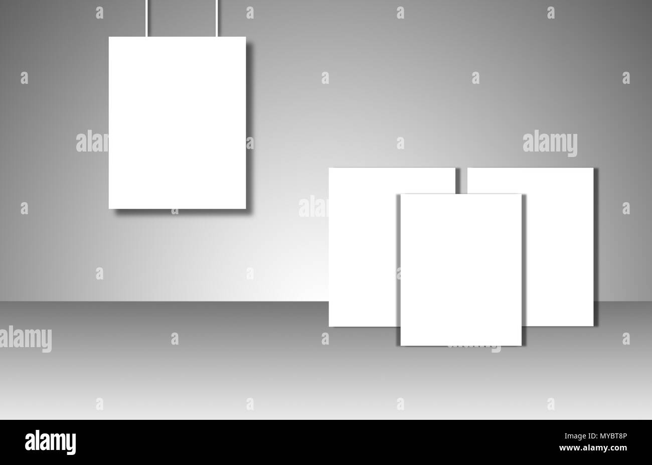 Empty white posters on gray background Stock Photo - Alamy