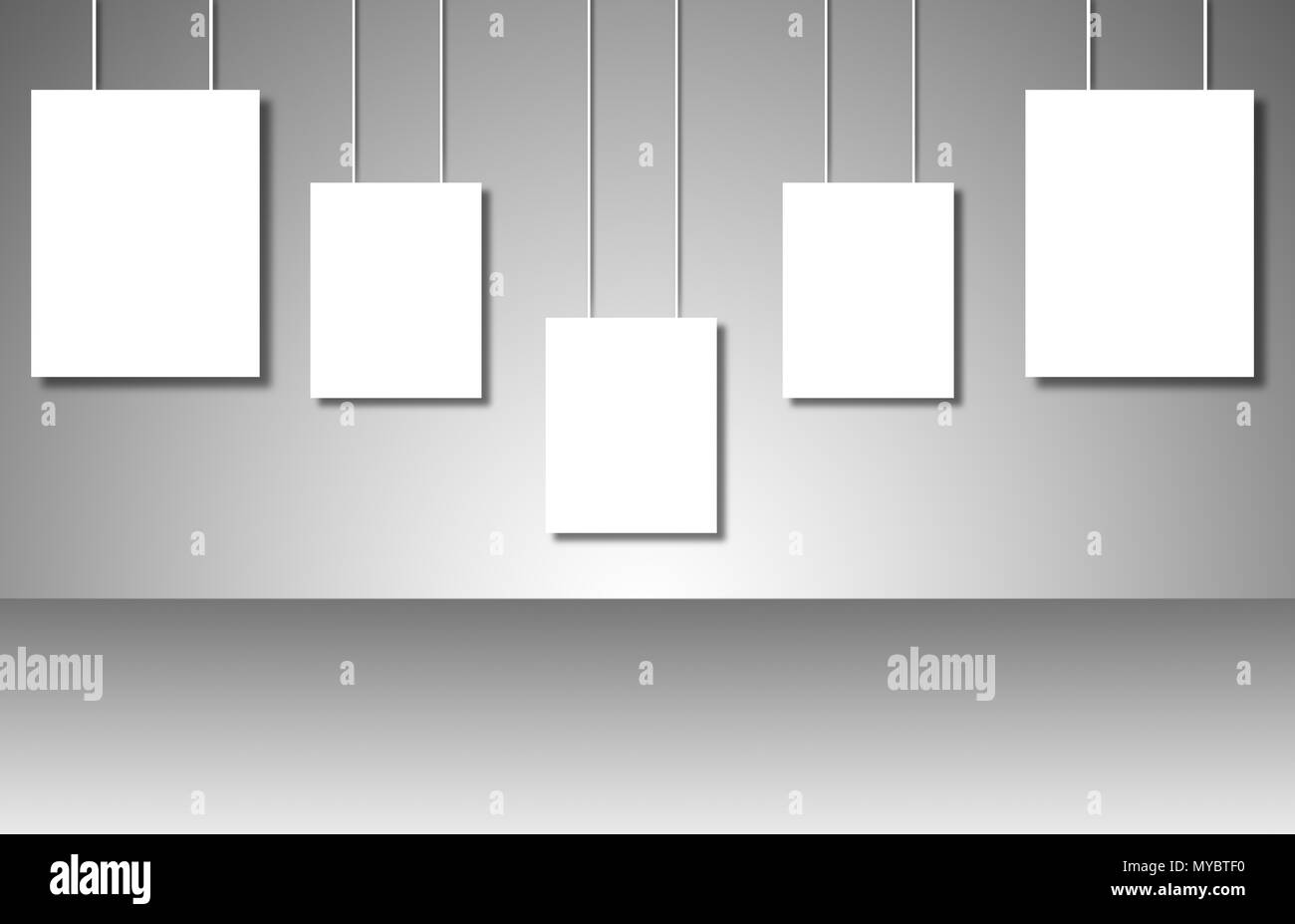 Empty white posters on gray background Stock Photo - Alamy