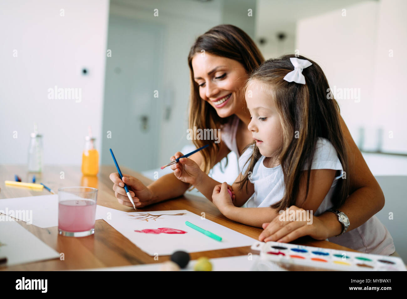 Happy family having fun time at home Stock Photo - Alamy