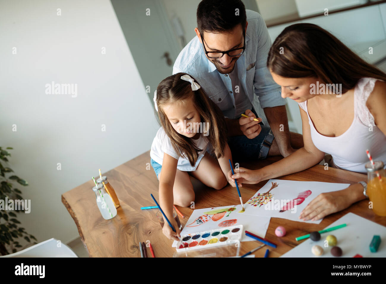 Happy family having fun time at home Stock Photo - Alamy