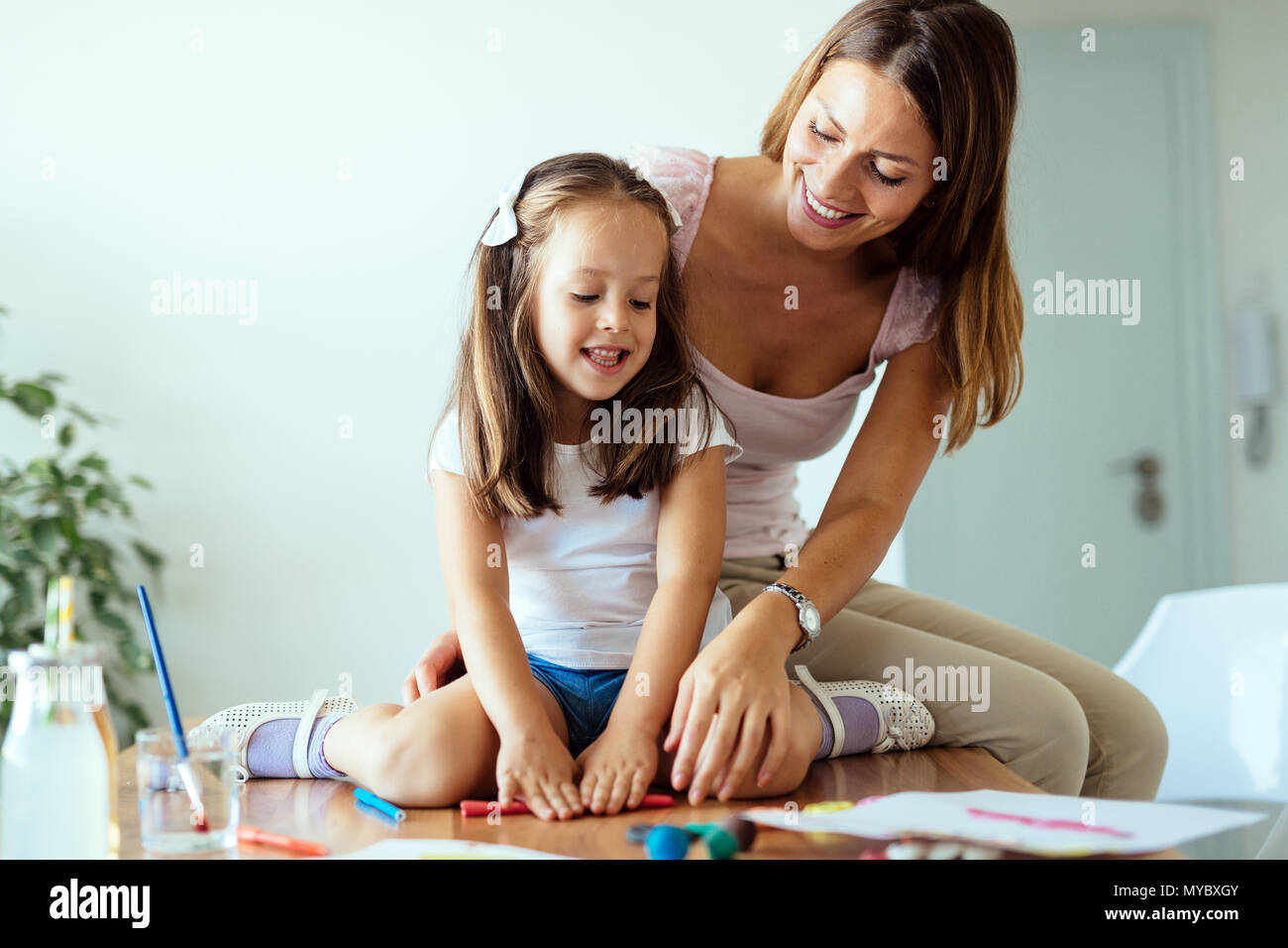 Happy family having fun time at home Stock Photo - Alamy