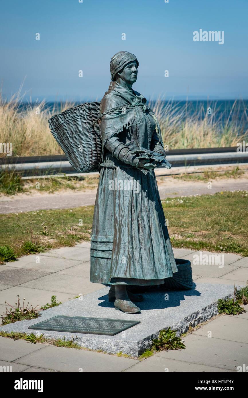 Statue of The Nairn Fishwife in the harbour at Nairn, Moray Firth ...