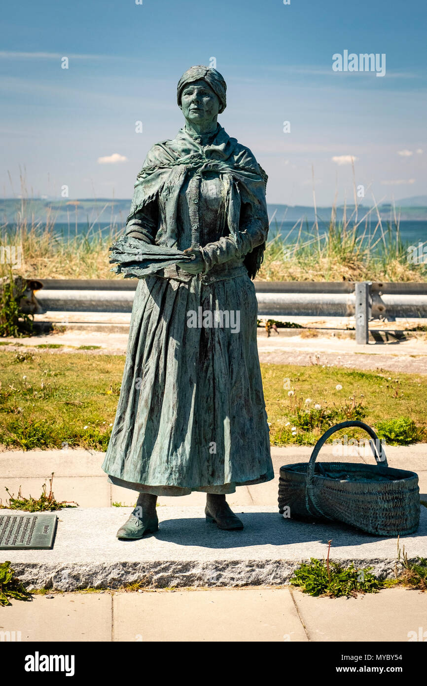 Statue of The Nairn Fishwife in the harbour at Nairn, Moray Firth ...
