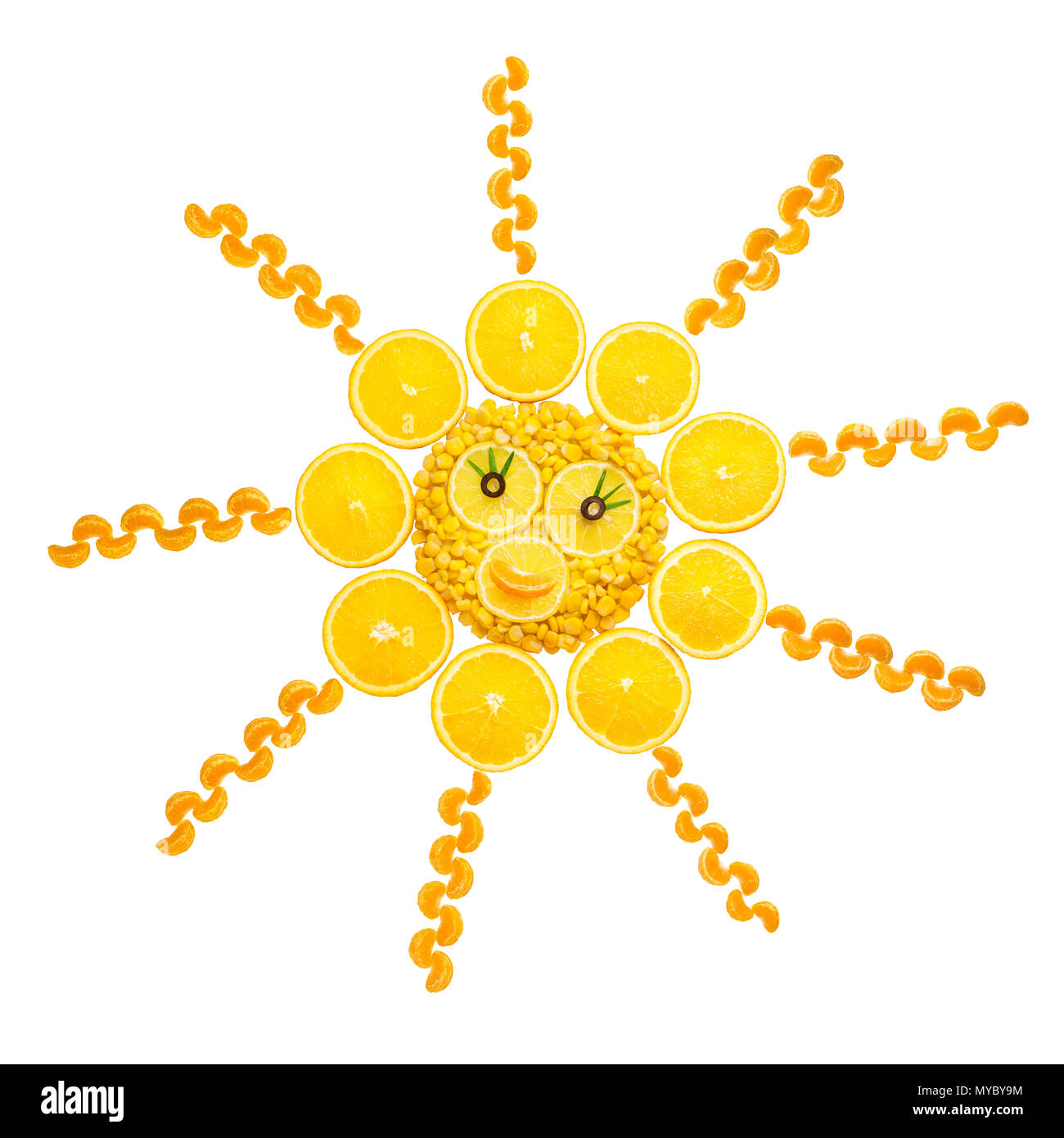 Creative concept photo of the sun made of fruits and vegetables on ...