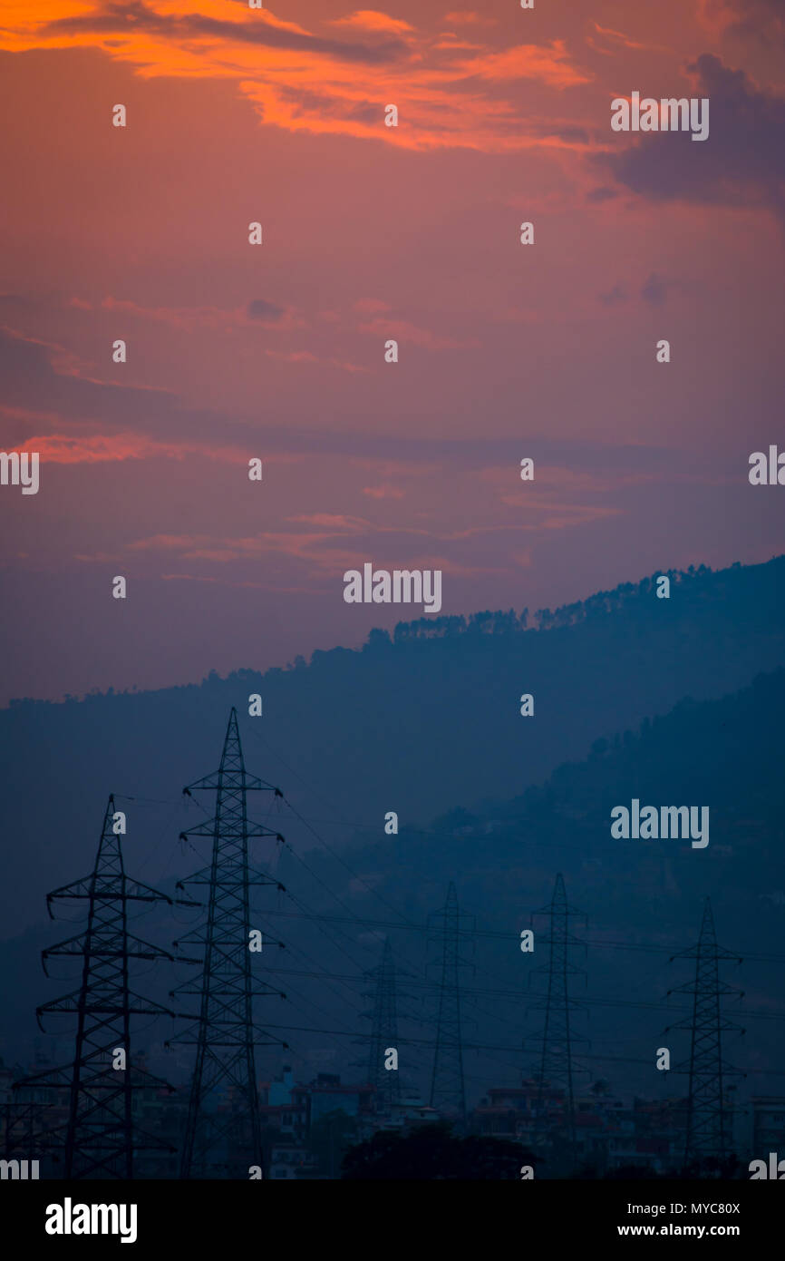 Silhouette Of Power Grid and Dramatic Sunset Sky Stock Photo - Alamy