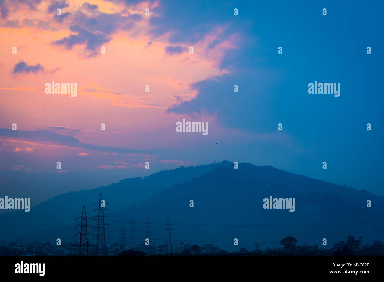 Silhouette Of Power Grid and Dramatic Sunset Sky Stock Photo - Alamy