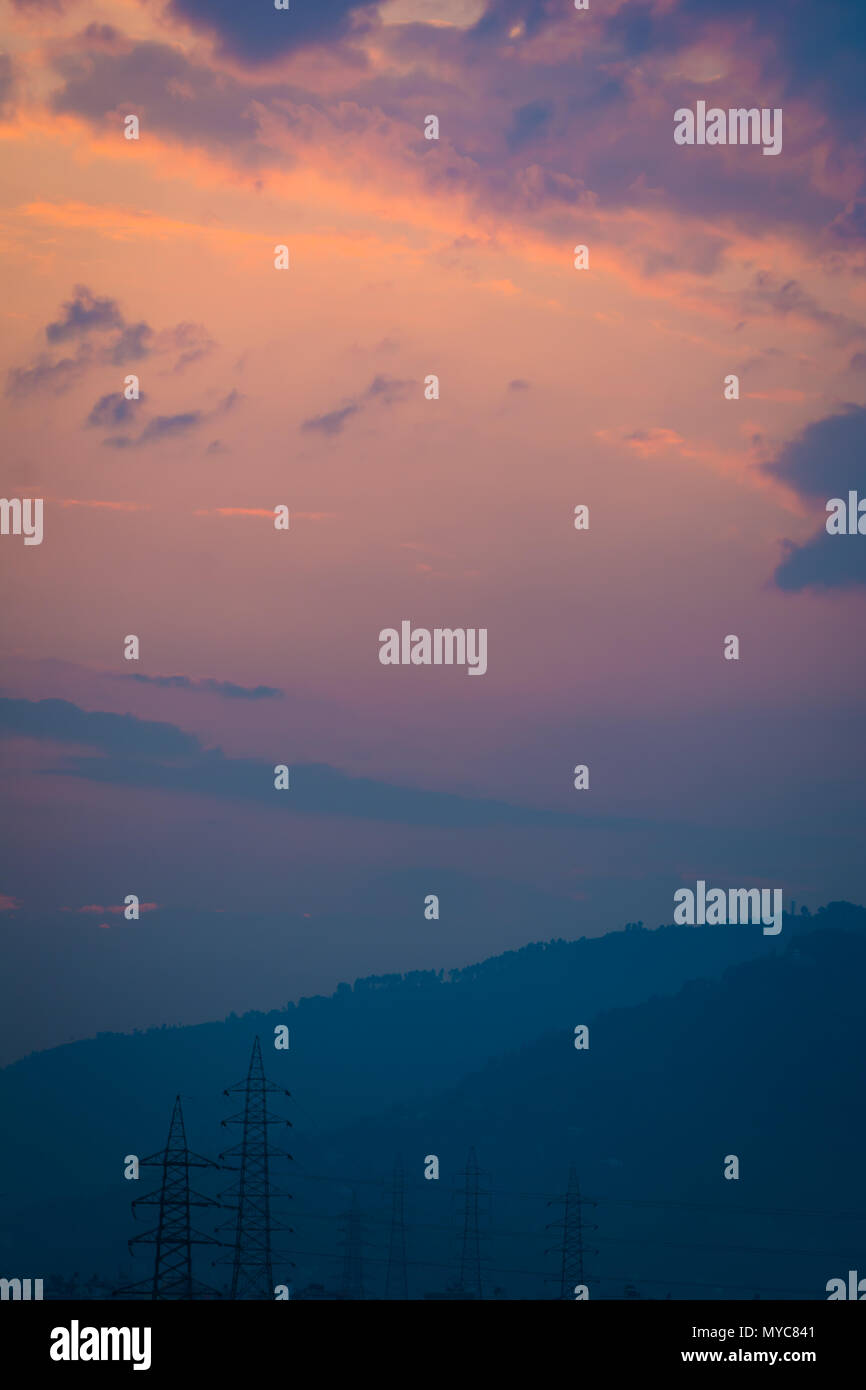 Silhouette Of Power Grid and Dramatic Sunset Sky Stock Photo - Alamy