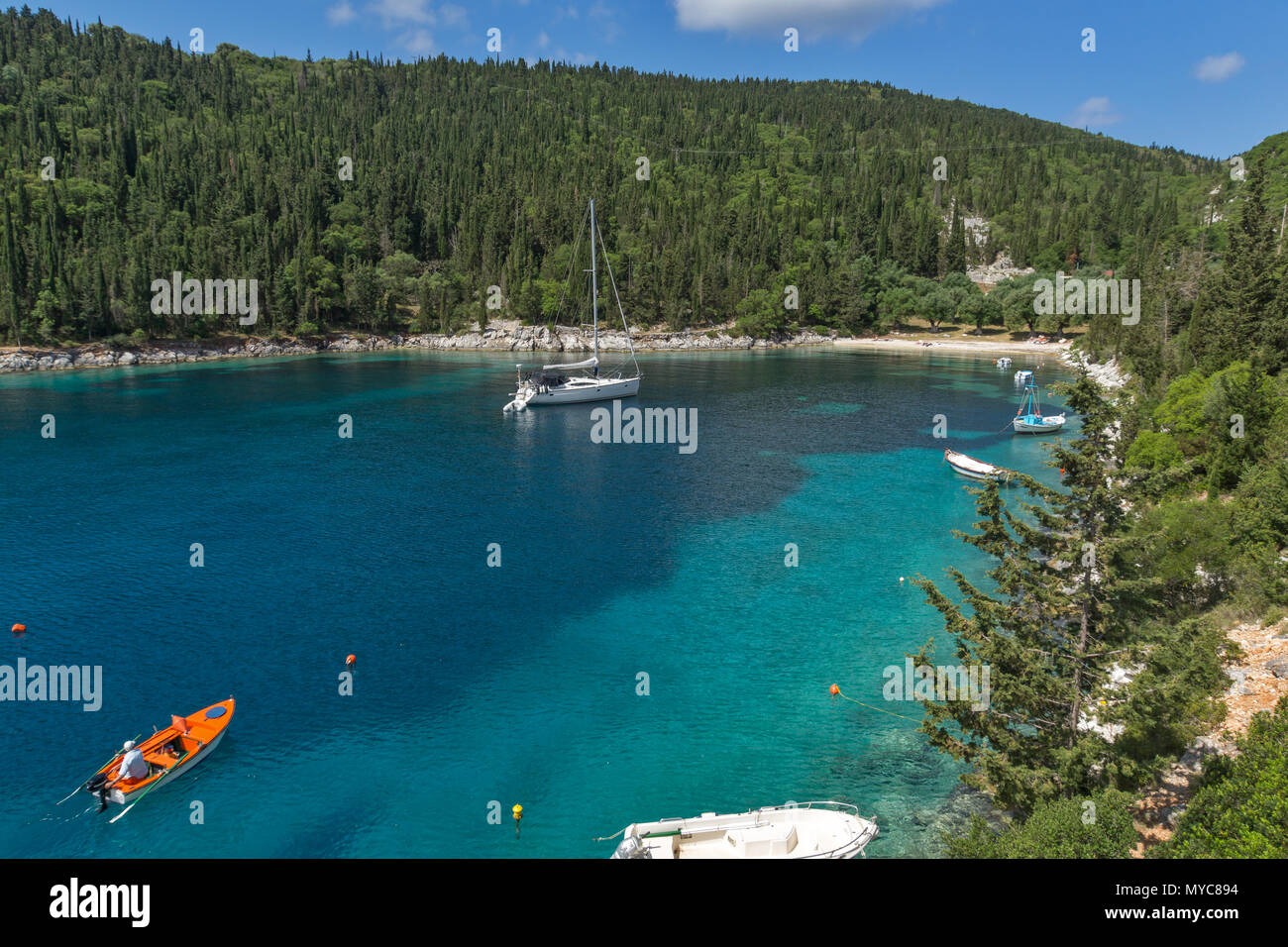 Clean waters of Foki Fiskardo Beach, Kefalonia, Ionian islands, Greece ...