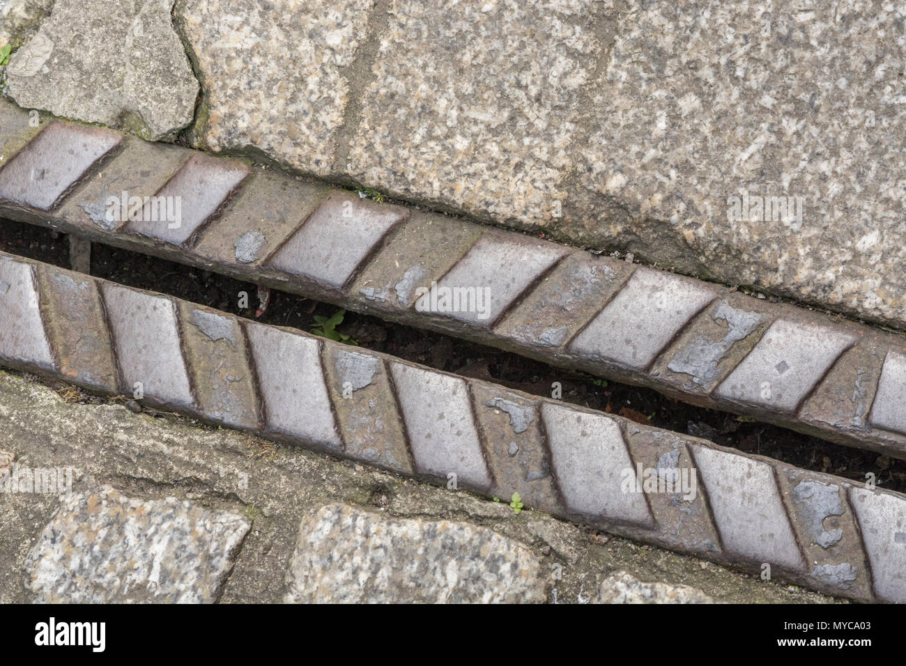 Pavement cast iron drain channel hi-res stock photography and images ...