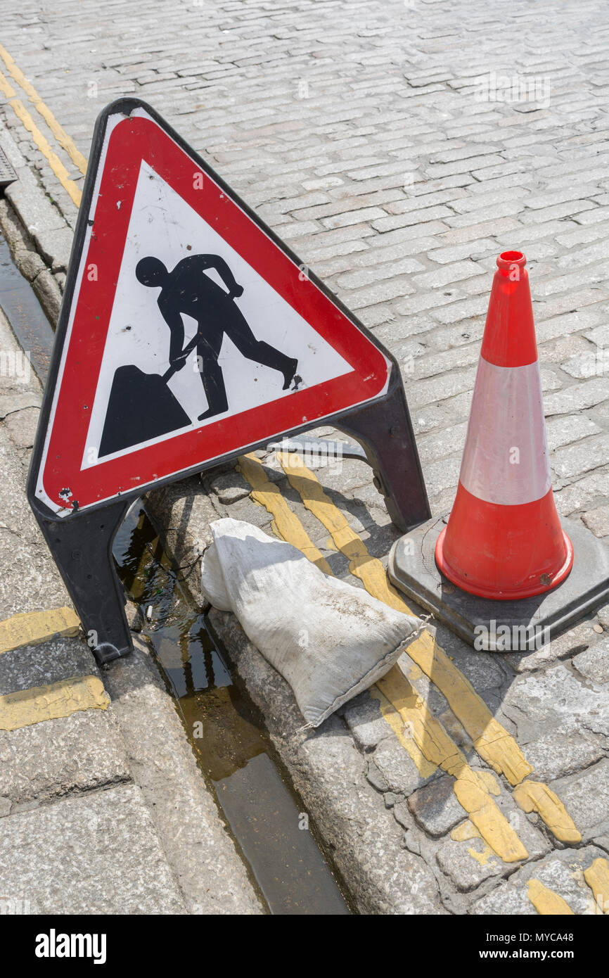 Man at Work roadworks sign in Truro, Cornwall. Concept roadworks, road ...