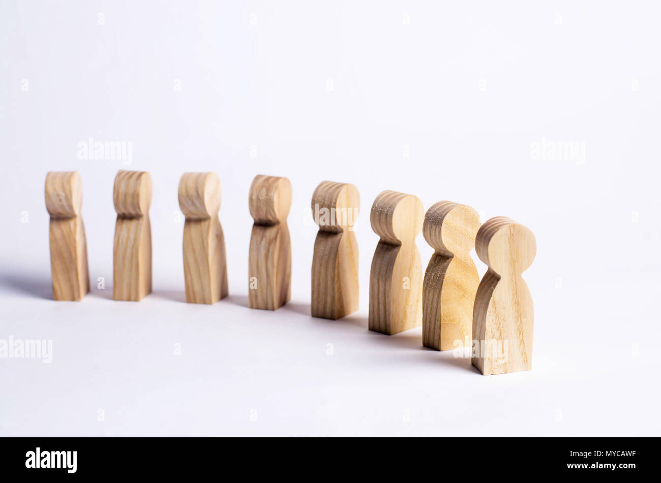 People stand in line at the briefing and wait for orders. Wooden ...