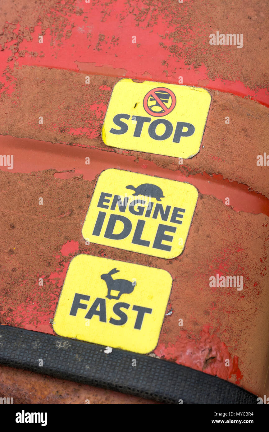 Small stickers on a tractor as a driver's reminder engine speed ...