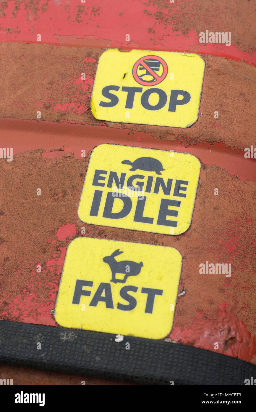 Small stickers on a tractor as a driver's reminder engine speed ...