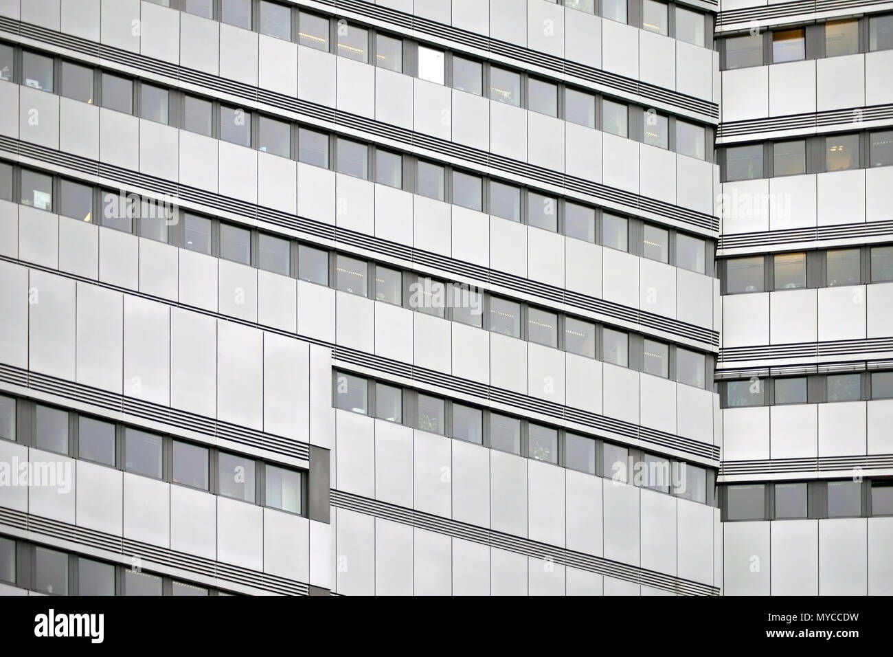 The modern facade of an office building with window rows Stock Photo ...