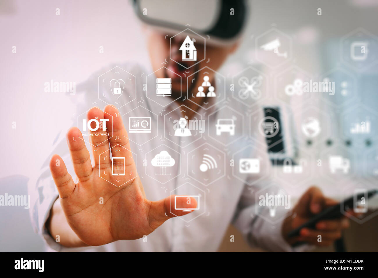 Internet of Things (IOT) technology with AR (Augmented Reality) on VR dashboard. businessman ...