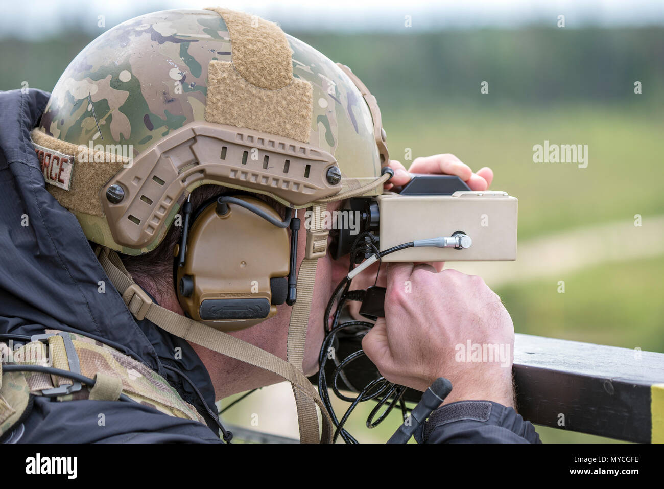 An American Air Force Joint Terminal Attack Controller surveys the ...