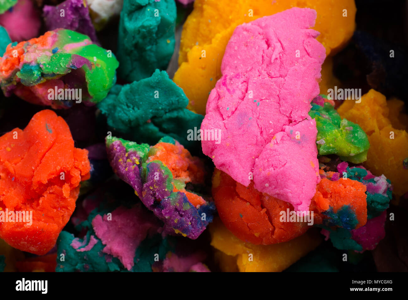 Dry colorful play dough in smal pieces Stock Photo - Alamy