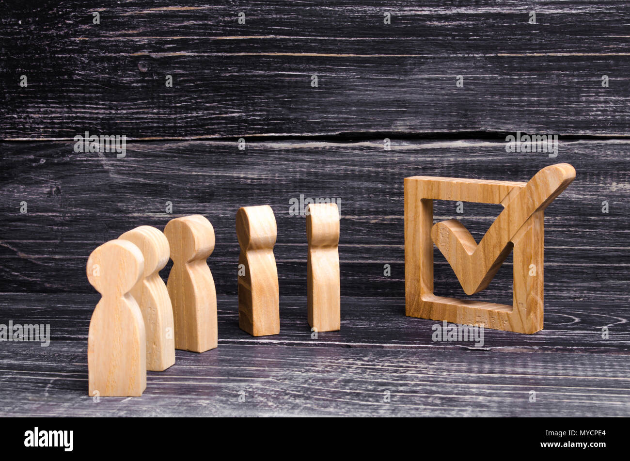 Live line of people is standing together to a tick in the box. The ...