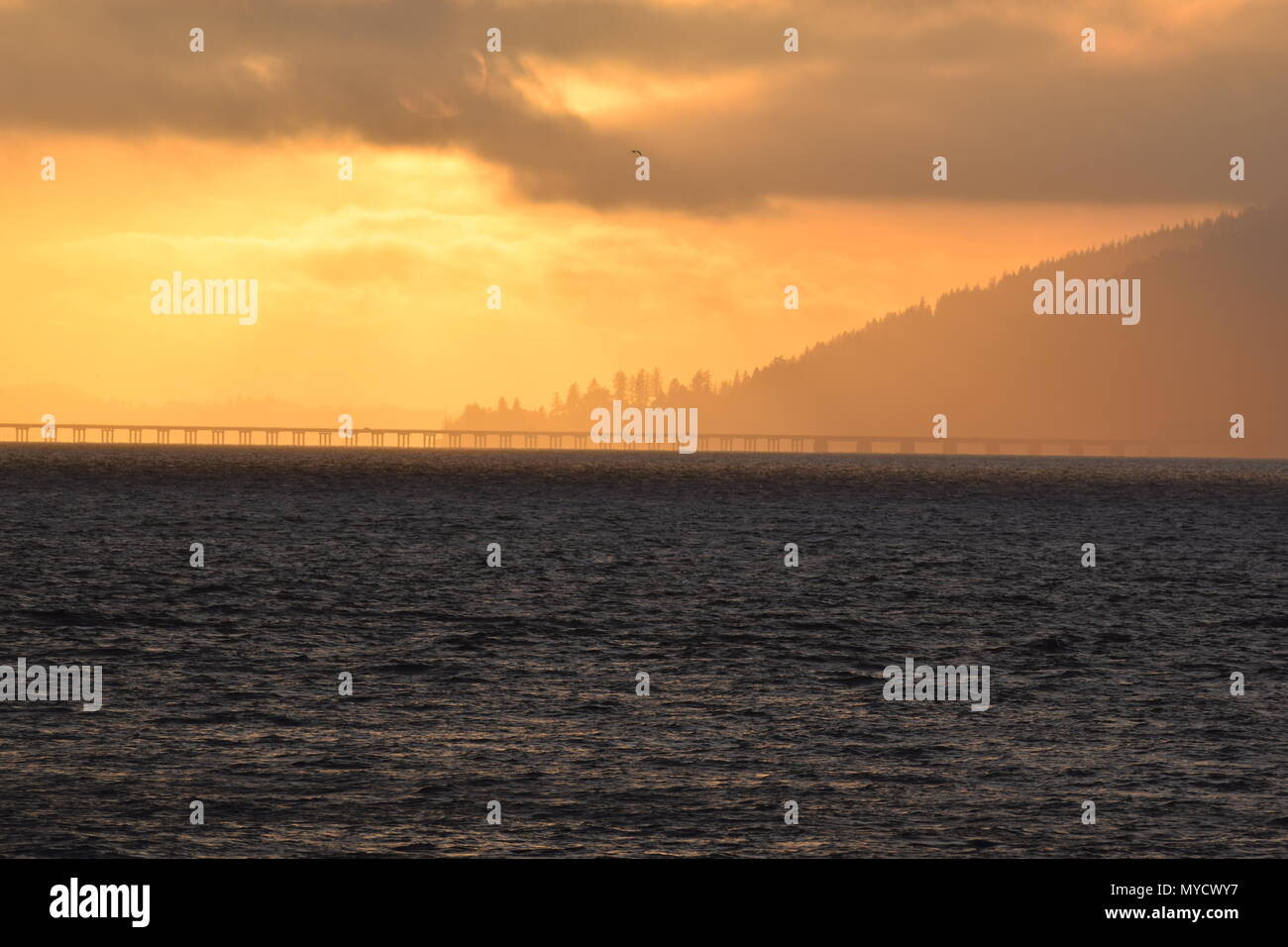 Astoria megler bridge at sunset and approaching storm hi-res stock ...