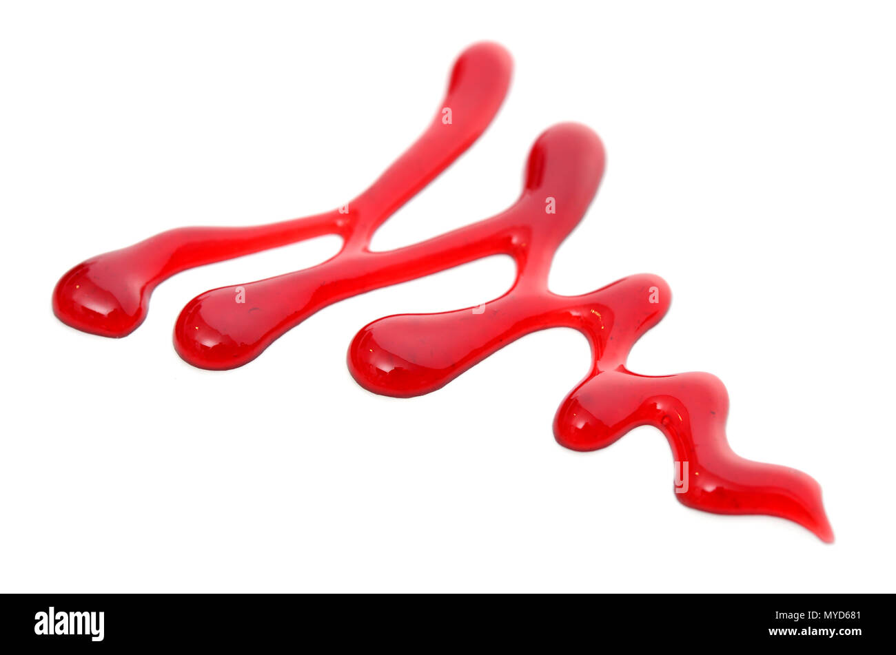 Strawberry sauce drip isolated on a white background Stock Photo - Alamy