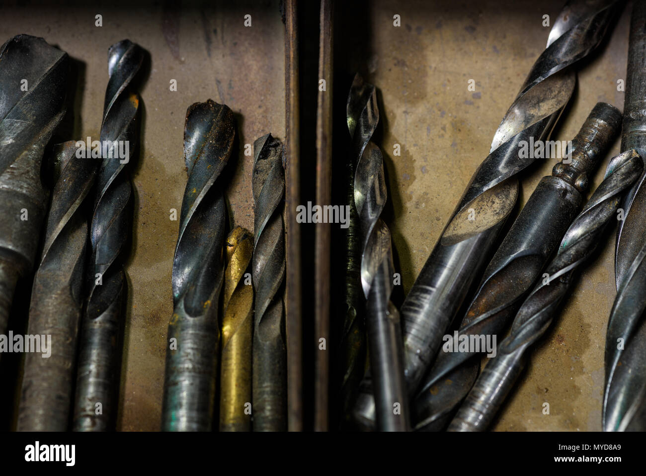 A selection of used drill bits Stock Photo - Alamy