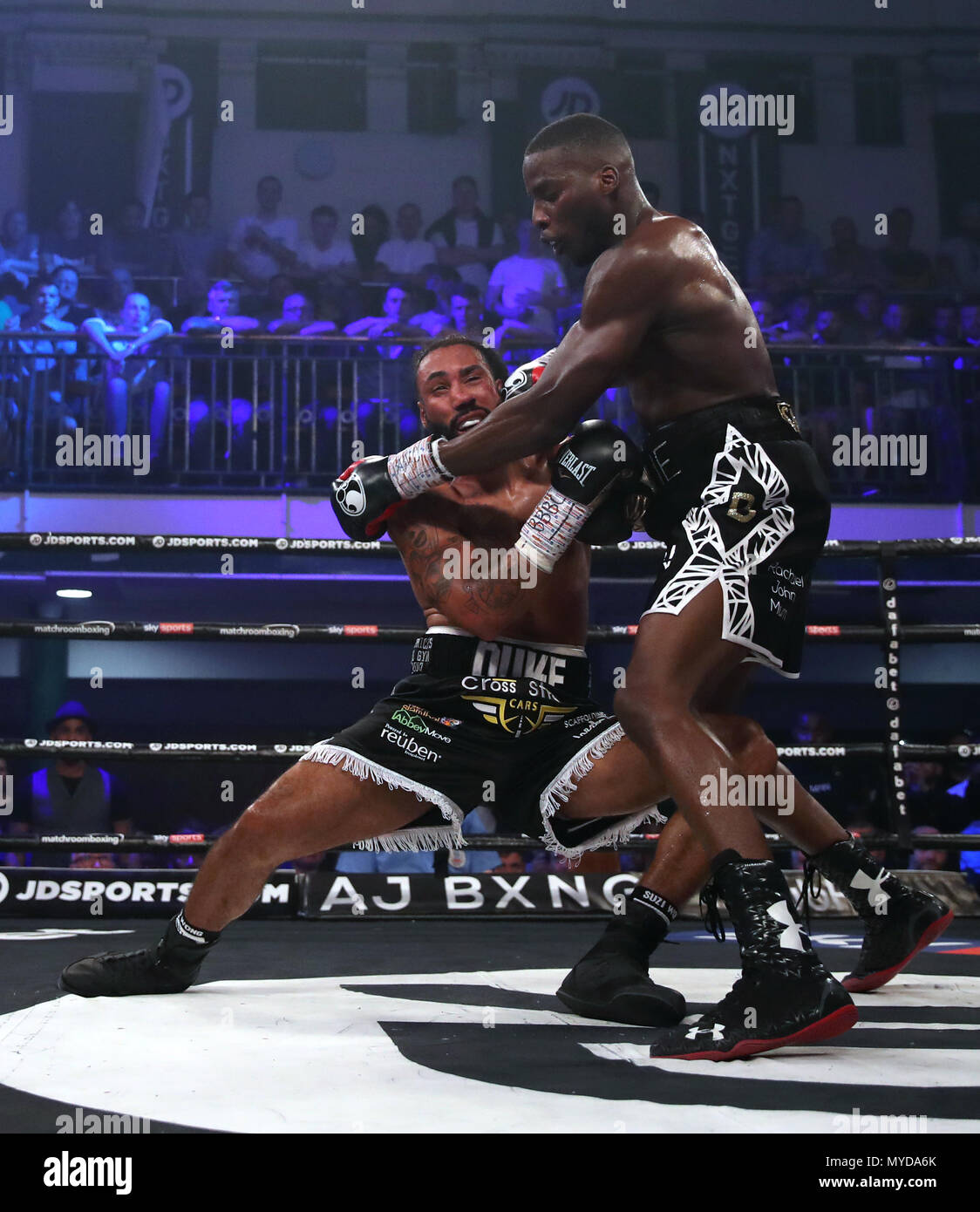 Luke Watkins is knocked down by Lawrence Okolie during the Commonwealth ...