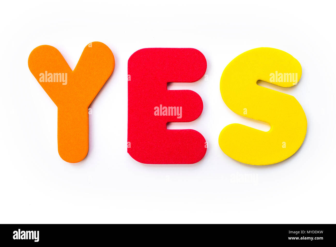 YES spelt out with coloured letters Stock Photo - Alamy