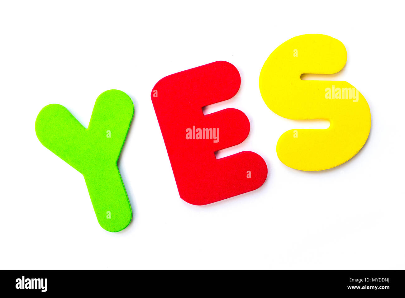 YES spelt out with coloured letters Stock Photo - Alamy