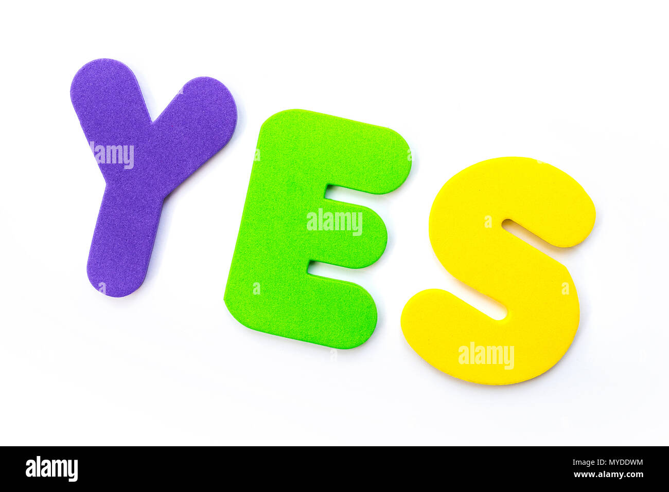 YES spelt out with coloured letters Stock Photo - Alamy
