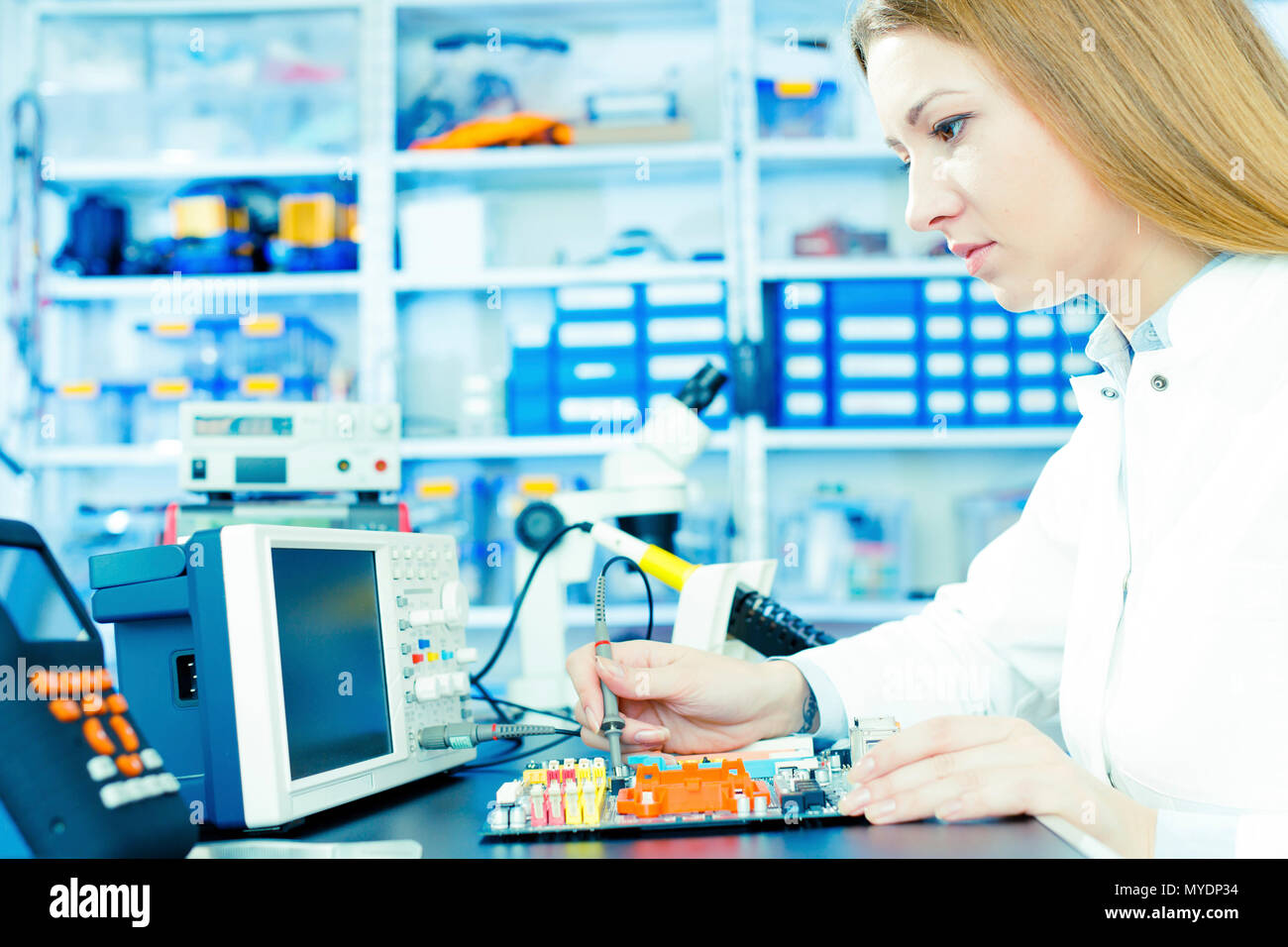 Technician testing circuit in microelectronics laboratory Stock Photo ...